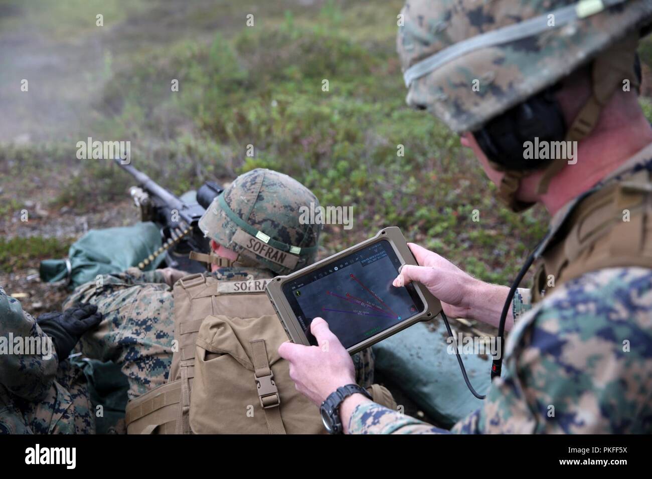 A U.S. Marine with Marine Rotational Force-Europe 18.1 uses a Marine ...