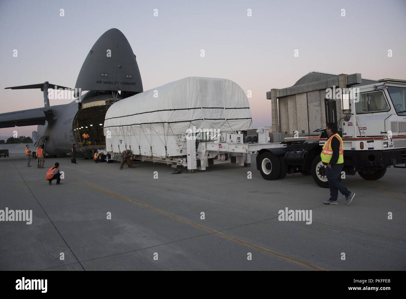 A combined team of U.S. Air Force personnel and civilian ground support ...