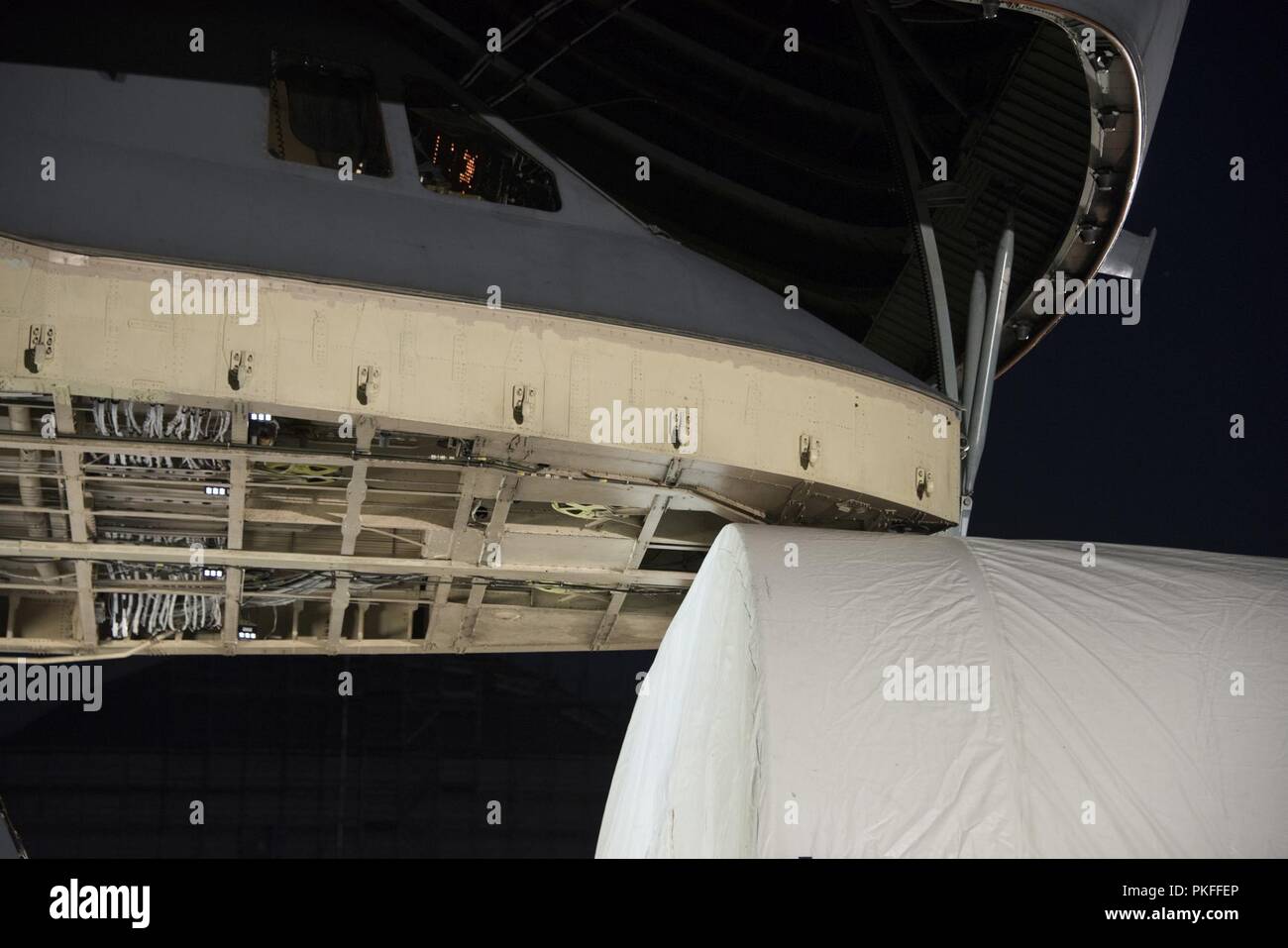 The top part of a U.S. Air Force C-5M Super Galaxy aircraft as the ...