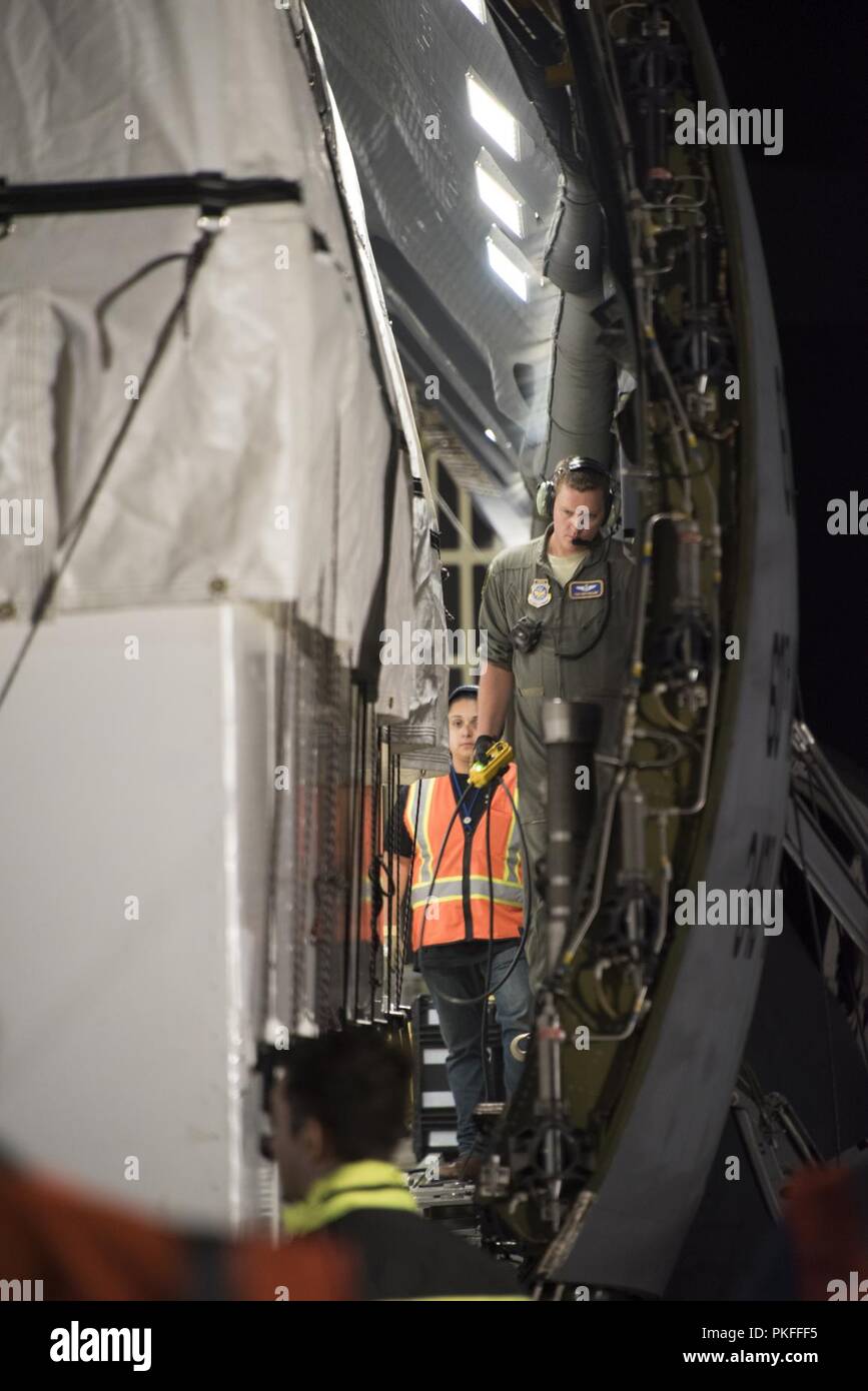 U.S. Air Force aircrew and ground support personnel load the Advanced ...