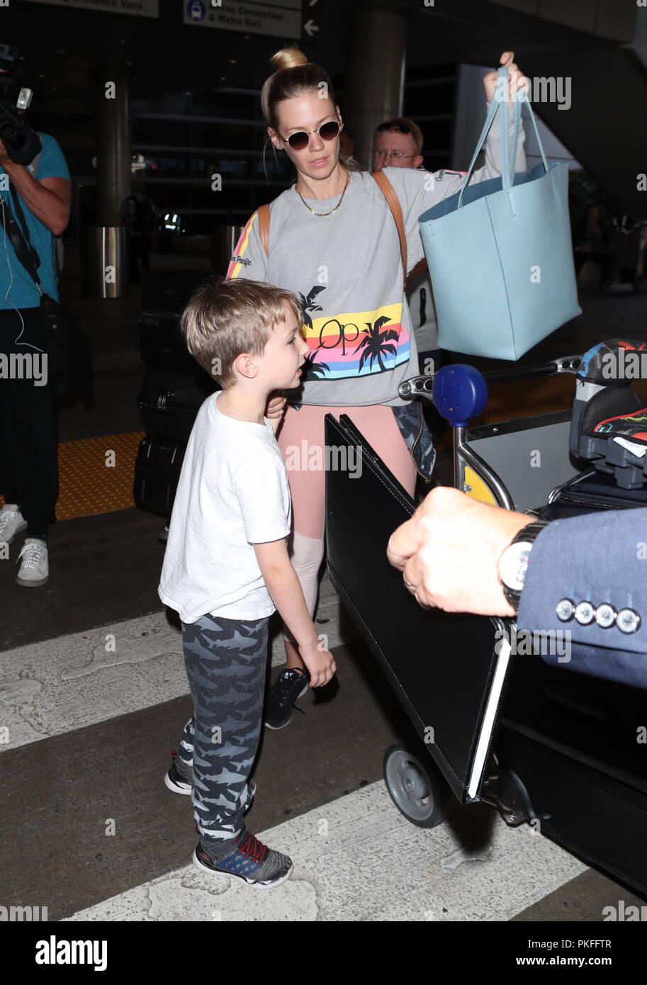 January Jones and her son, Xander, at Los Angeles International Airport ...