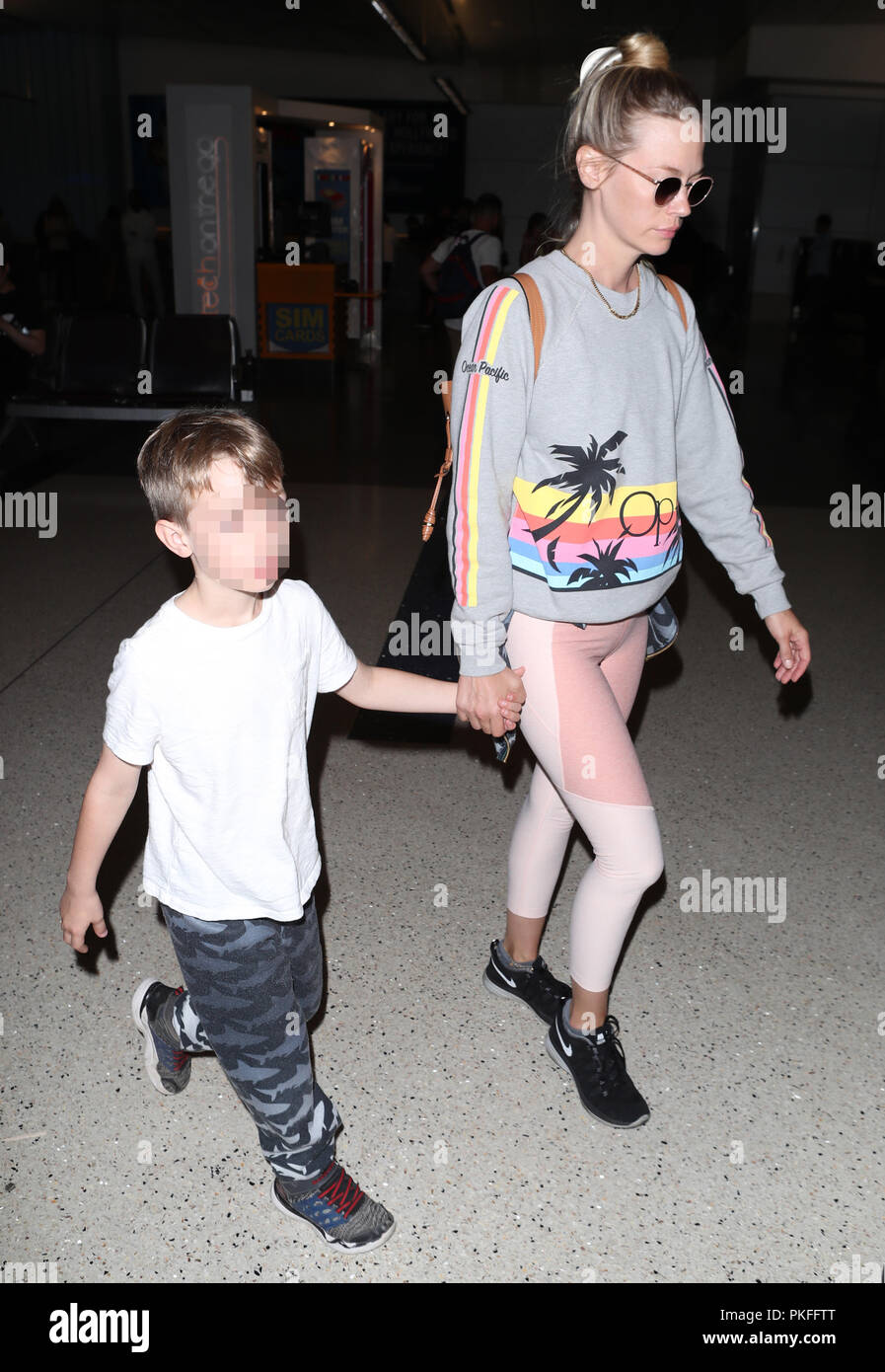 January Jones and her son, Xander, at Los Angeles International Airport ...