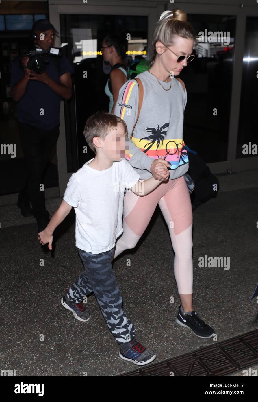 January Jones and her son, Xander, at Los Angeles International Airport ...