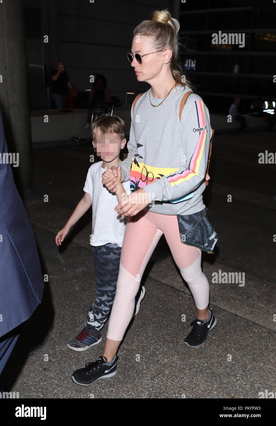 January Jones and her son, Xander, at Los Angeles International Airport ...