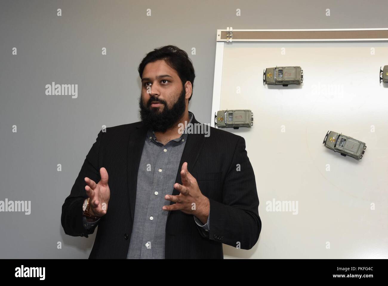 Imam Usman Khan answers questions asked by Airmen assigned to the 105th ...
