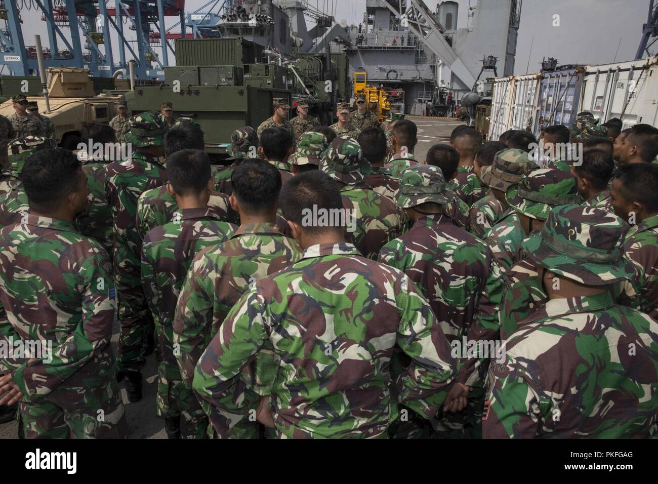 JAKARTA, INDONESIA (Aug. 12, 2018)- Indonesian marines listen in as ...