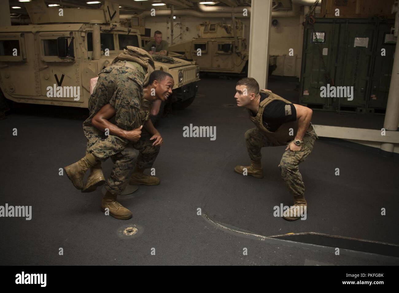 PACIFIC OCEAN - Sgt. Michael Farris, a field artillery section chief ...