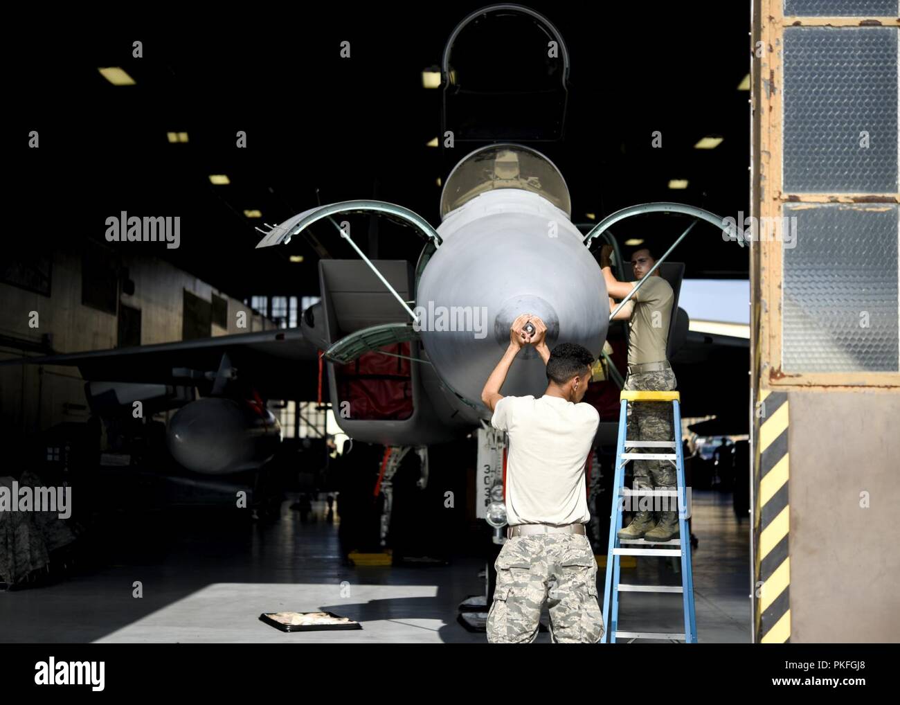 Airman Chris Hilton, front, and Airman 1st Class Dominik Roeglin, 362nd ...