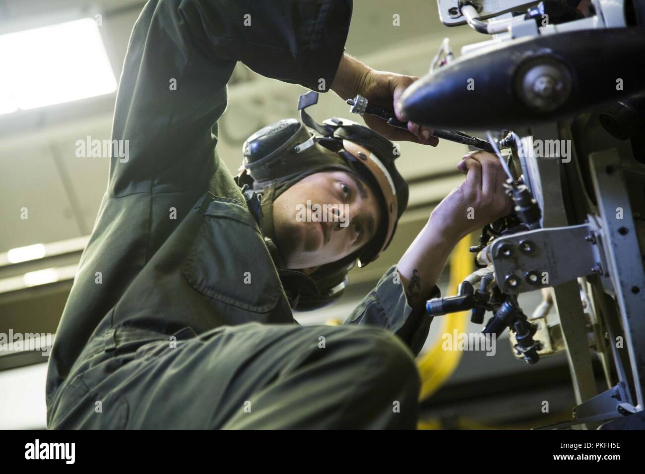PACIFIC OCEAN – U.S. Marine Lance Cpl. Vance Peb, a tiltrotor mechanic ...