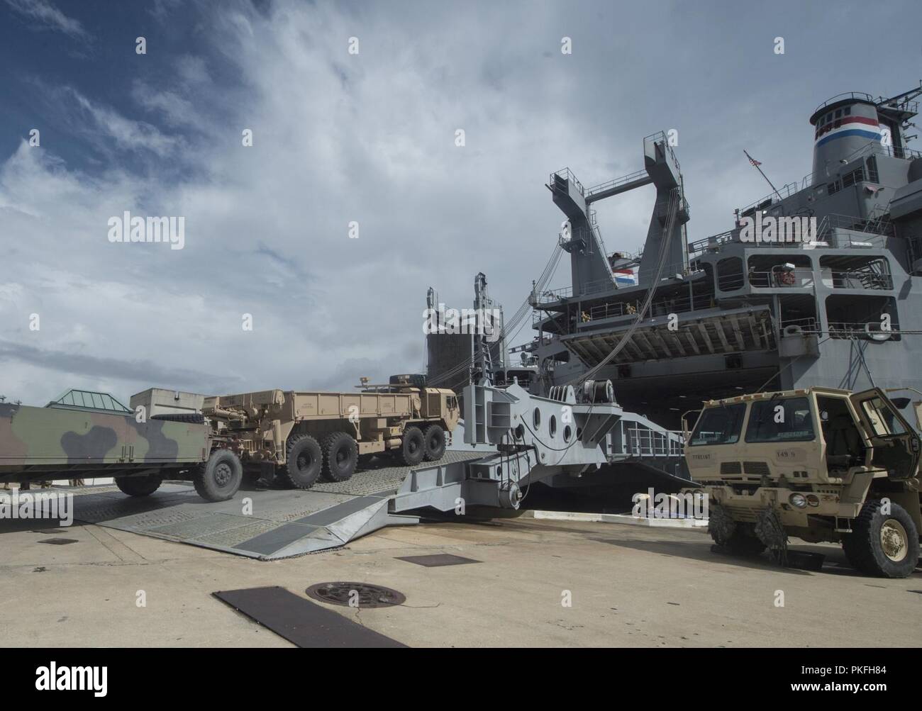 U.S. Army vehicles and assets are moved onto a vessel during Exercise ...