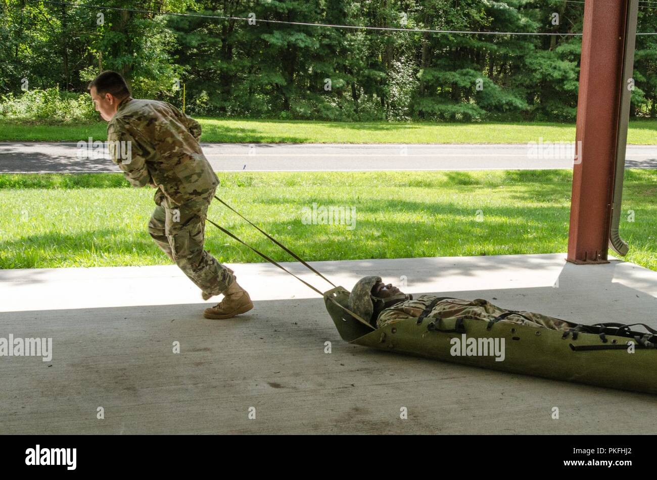 U.S. Army Reserve Soldiers test the ease of a dragging a litter as part ...