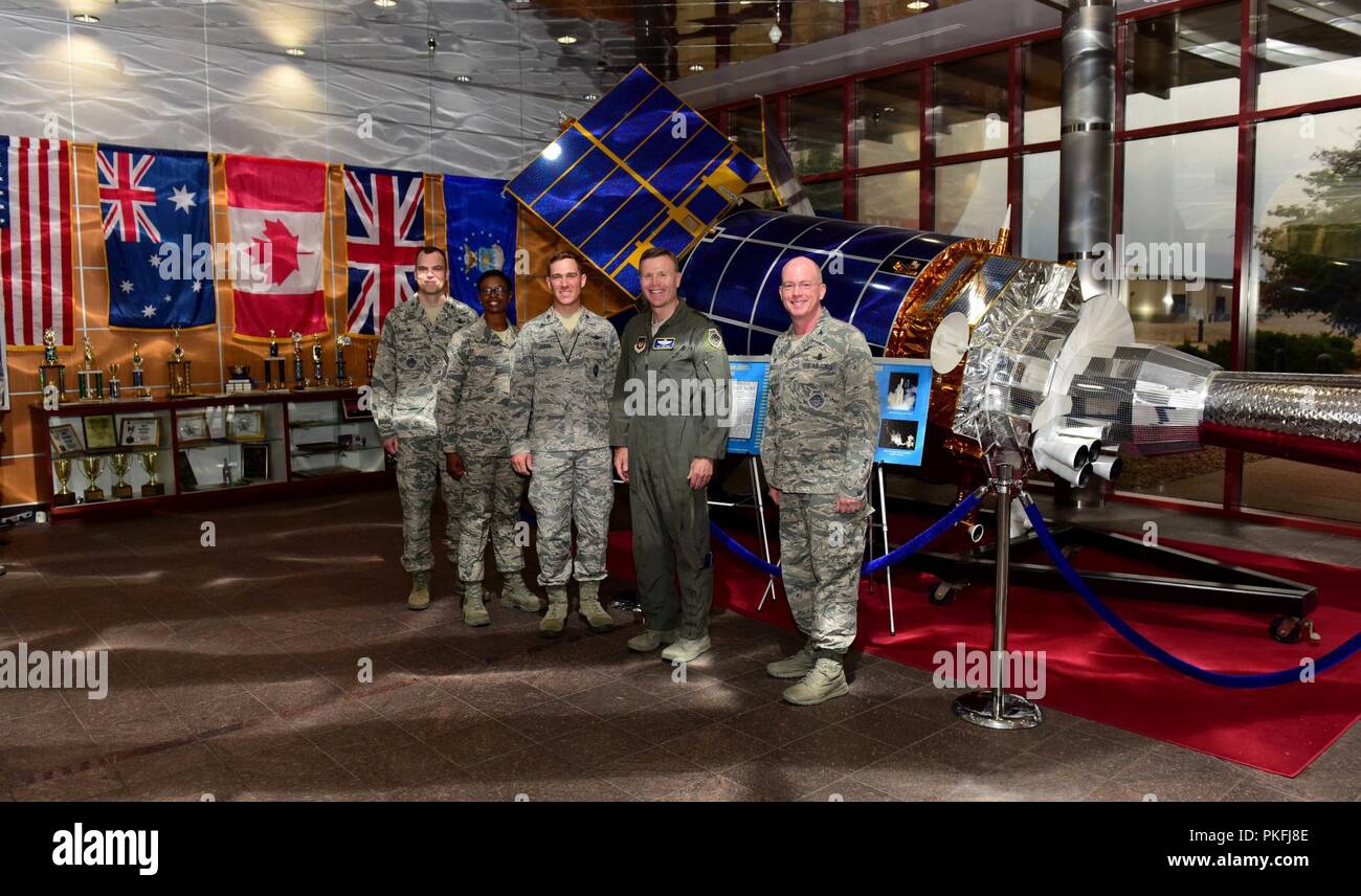 From left to right, Col. Robert Hutt, 460th Operations Group commander ...