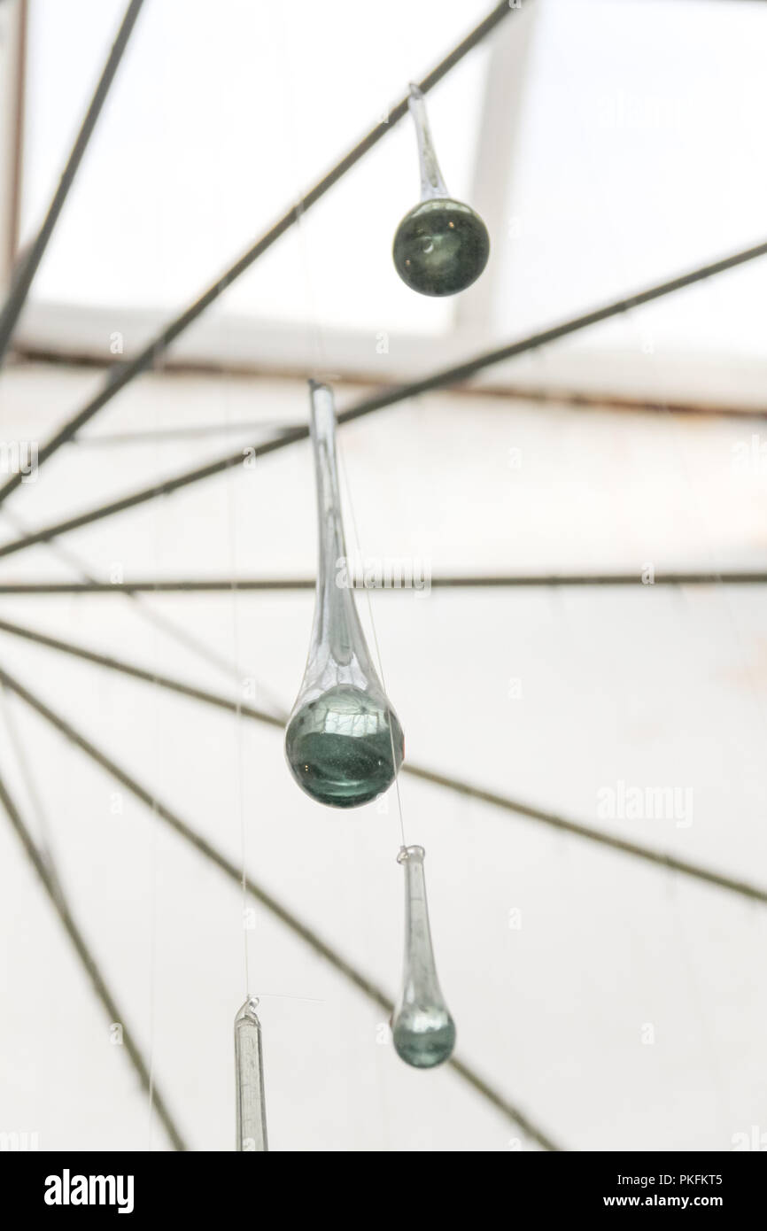 Suspended Glass Drops Chandelier Reflecting the Room Stock Photo - Alamy
