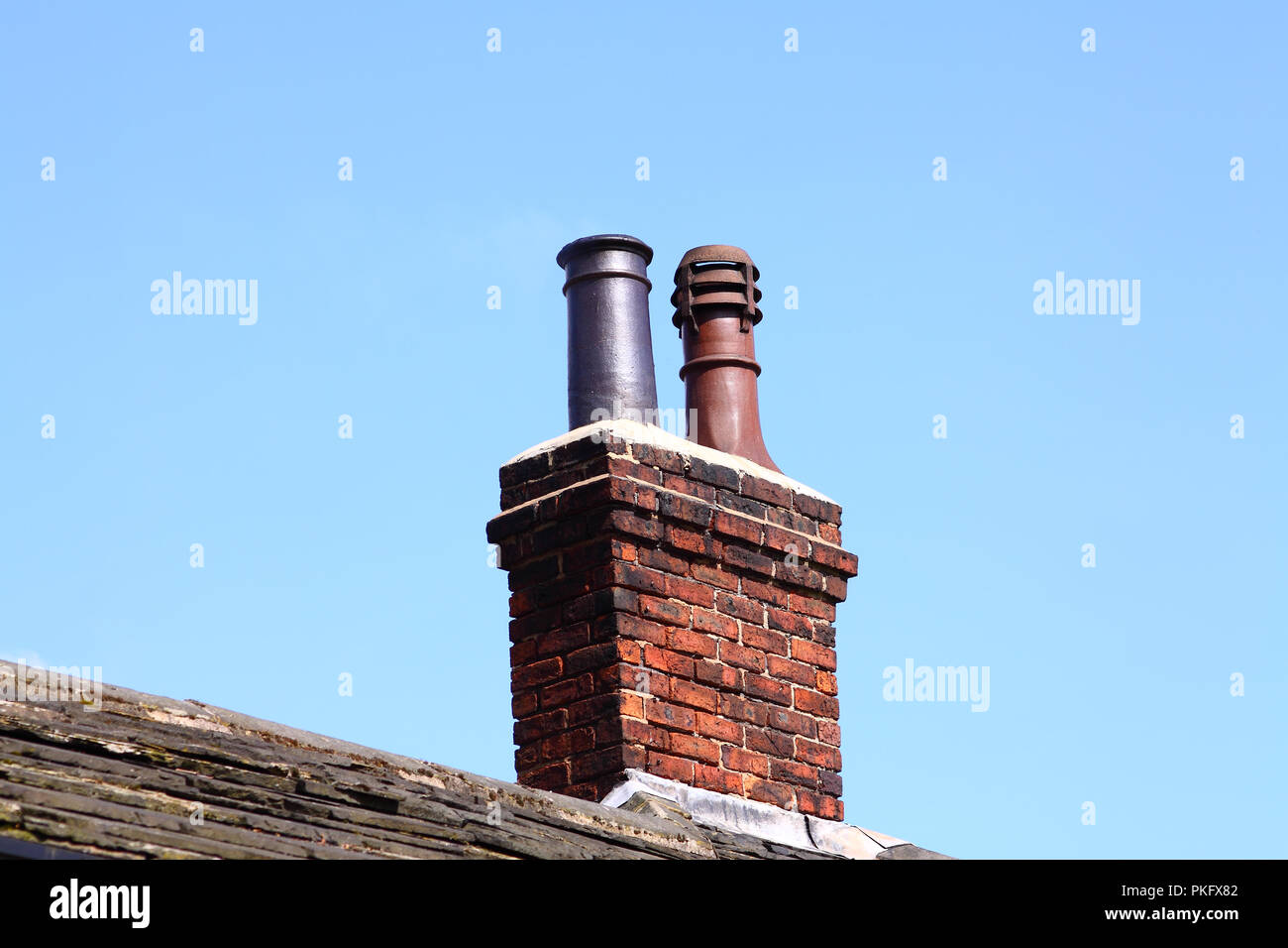 Roof top chimneys Stock Photo - Alamy