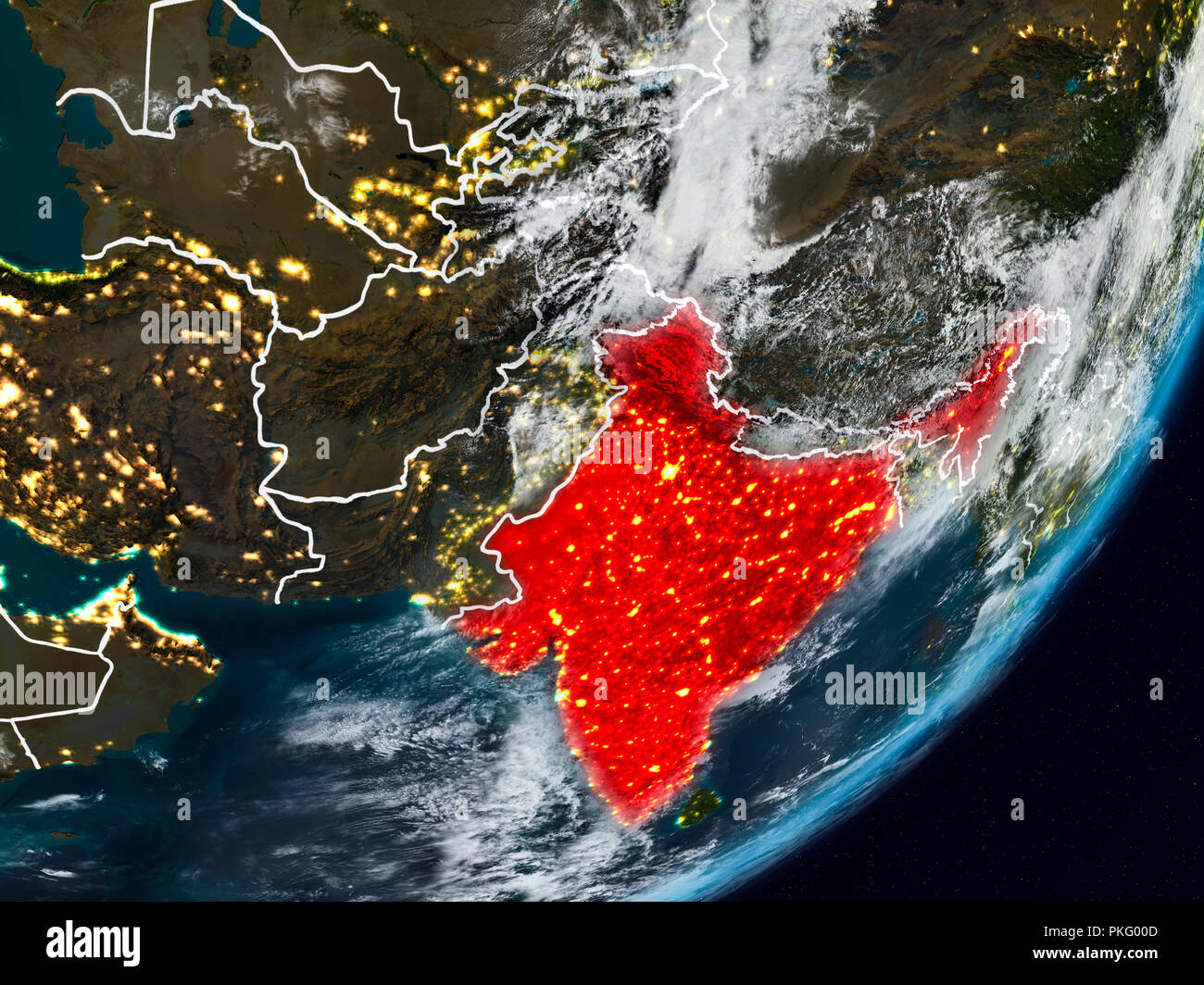 India from space on planet Earth at night with visible country borders ...