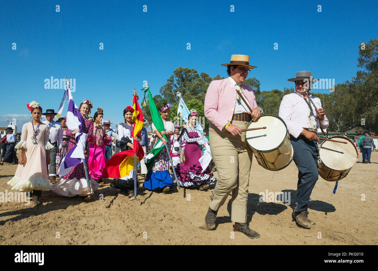Musicians and young women wearing colourful gypsy dresses, Pentecost ...