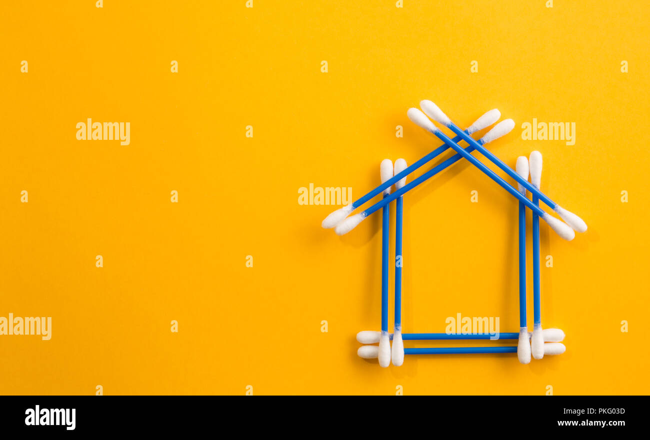 The symbol of a house made of blue sticks Stock Photo - Alamy
