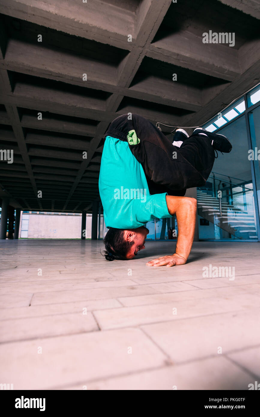 Boy doing headstand hi-res stock photography and images - Alamy
