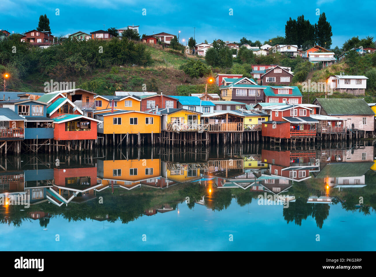 Traditional stilt houses know as palafitos in the city of Castro at ...