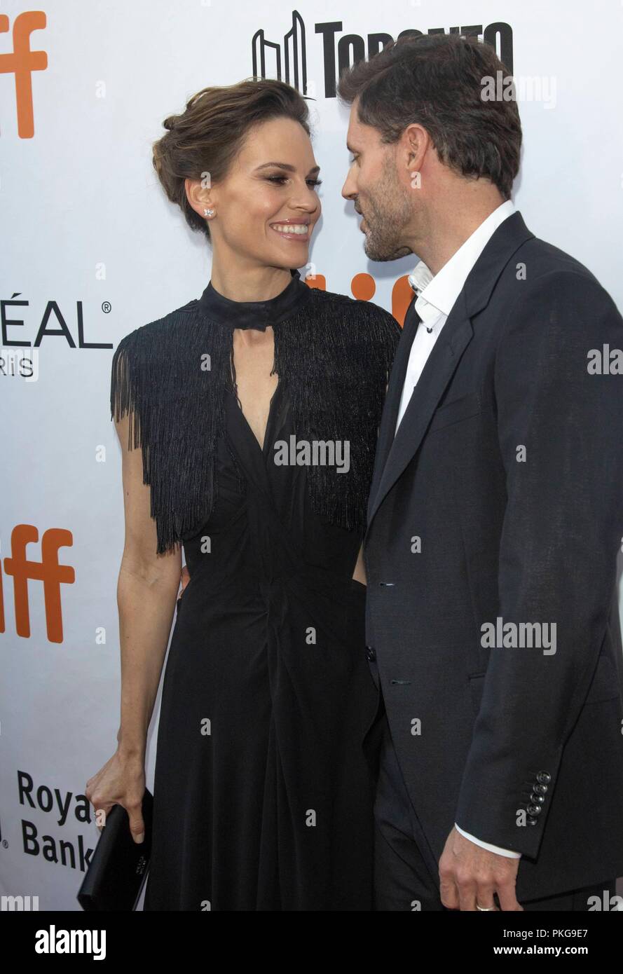 Hilary Swank and Philip Schneider attend the premiere of 'What They ...