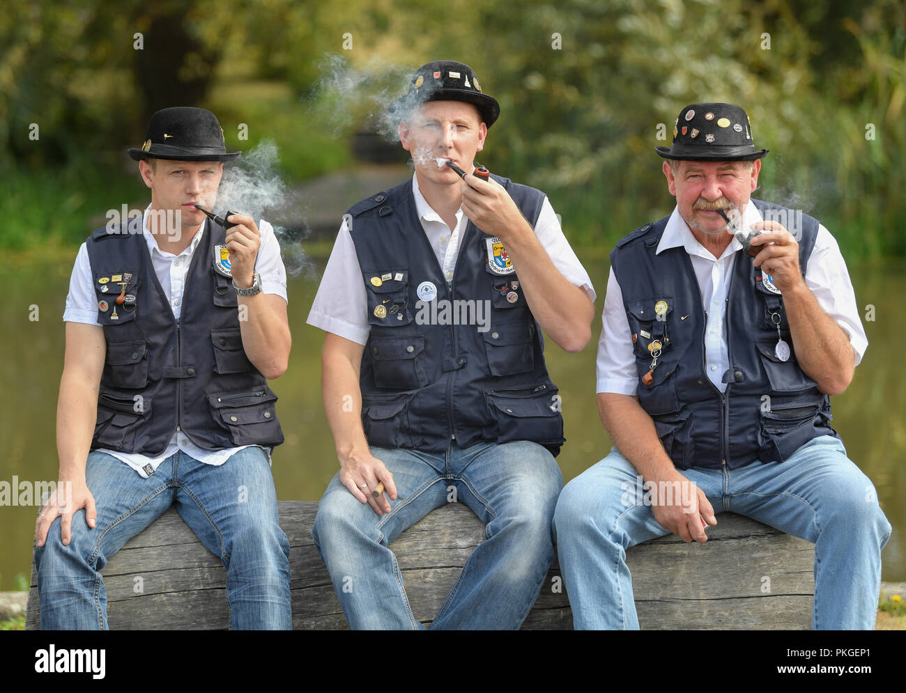 Father smoking a pipe hi-res stock photography and images - Alamy