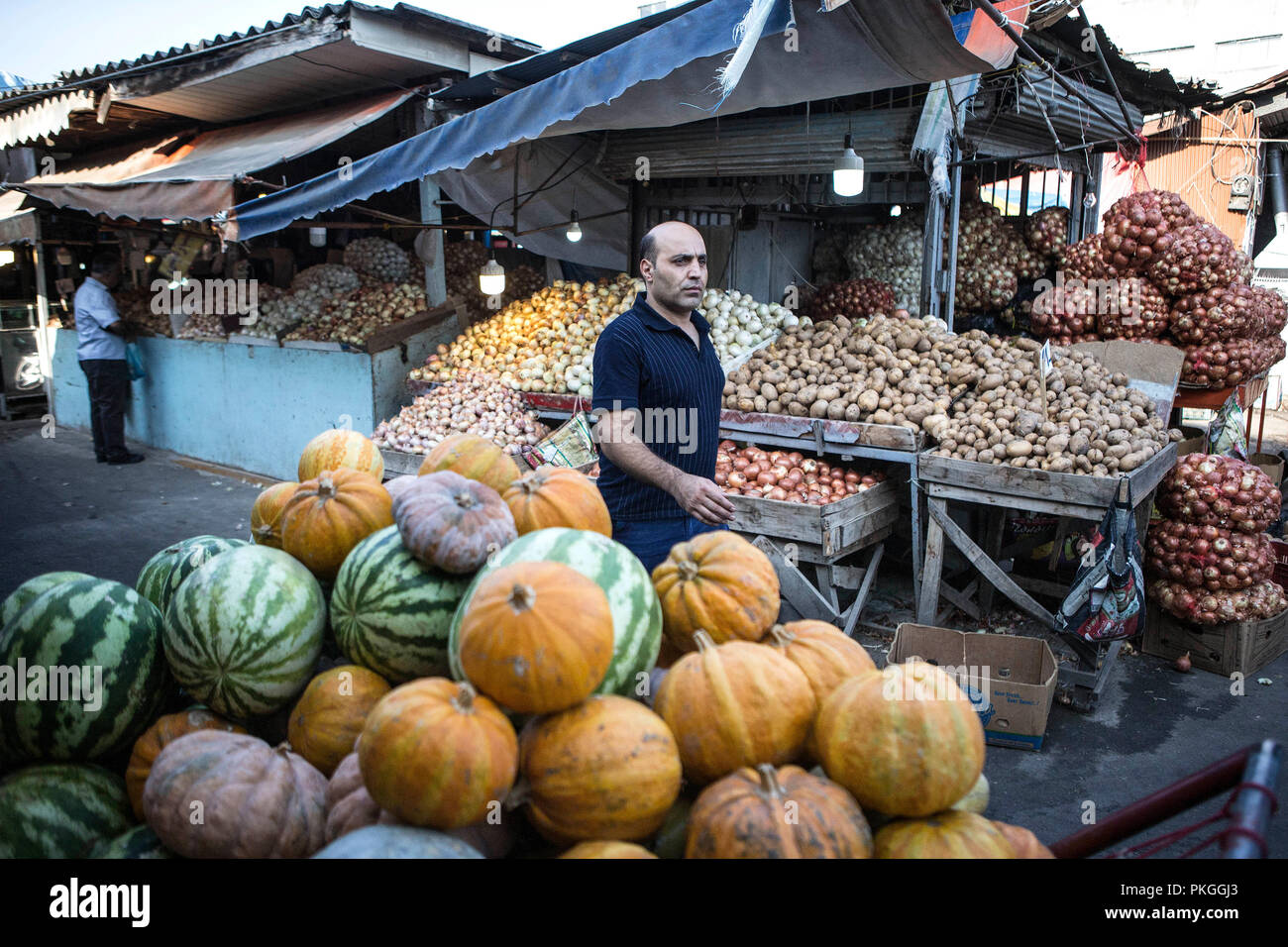 Rasht, Iran. 13th Sep, 2018. An Iranian man walks at old bazaar in ...