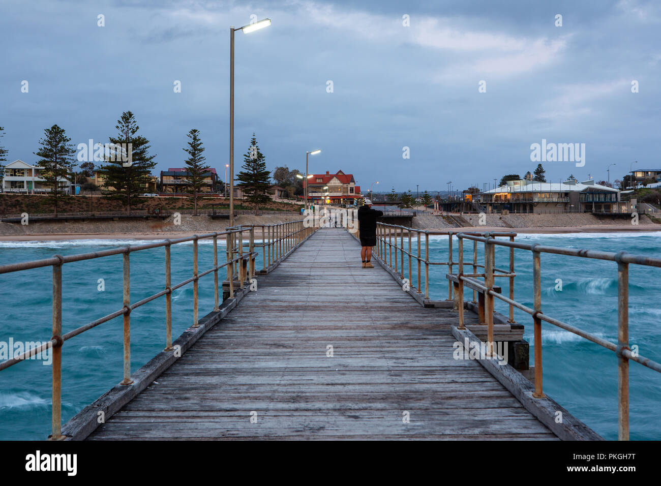 Fisherman on jetty hi-res stock photography and images - Alamy
