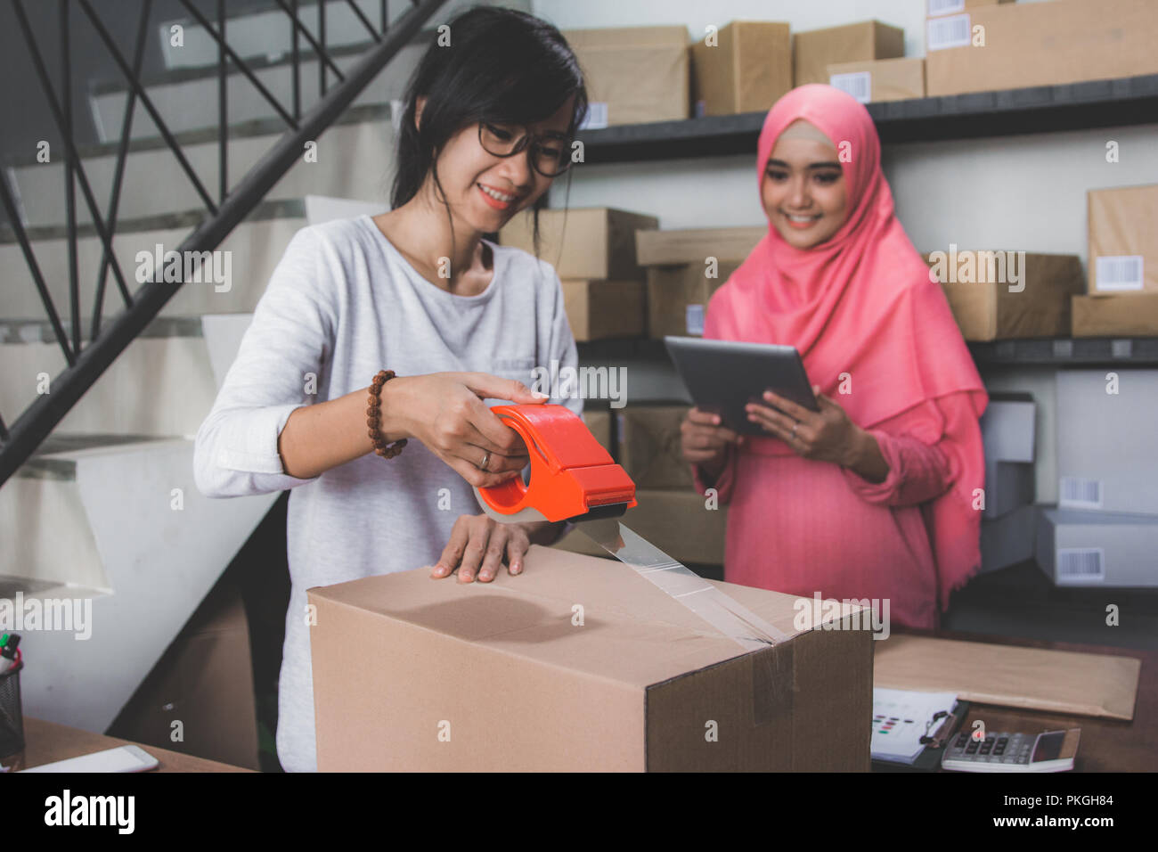 woman business partner in small office Stock Photo - Alamy