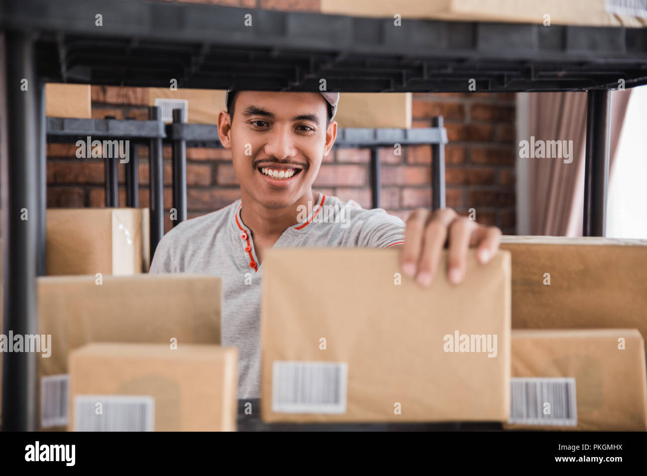 Counting packages hi-res stock photography and images - Alamy