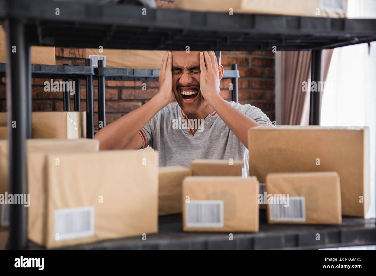 stress man while working Stock Photo - Alamy