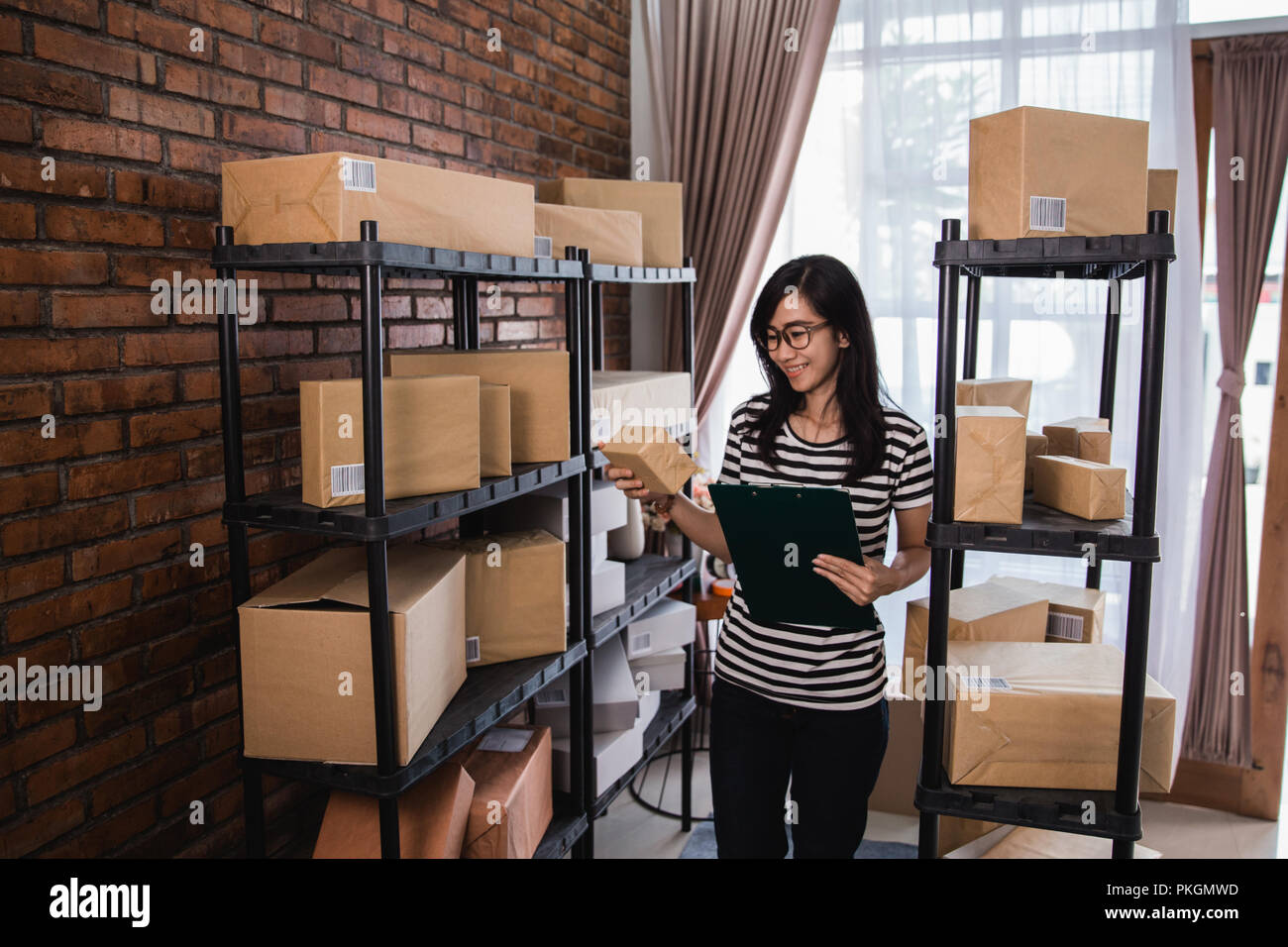young asian online business owner Stock Photo - Alamy