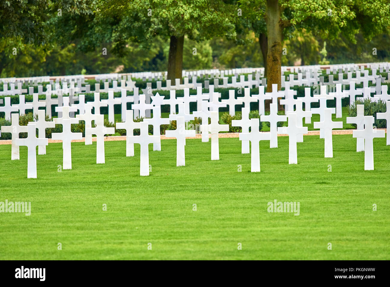 Rows and lines of headstones at the american war cemetery and memorial ...