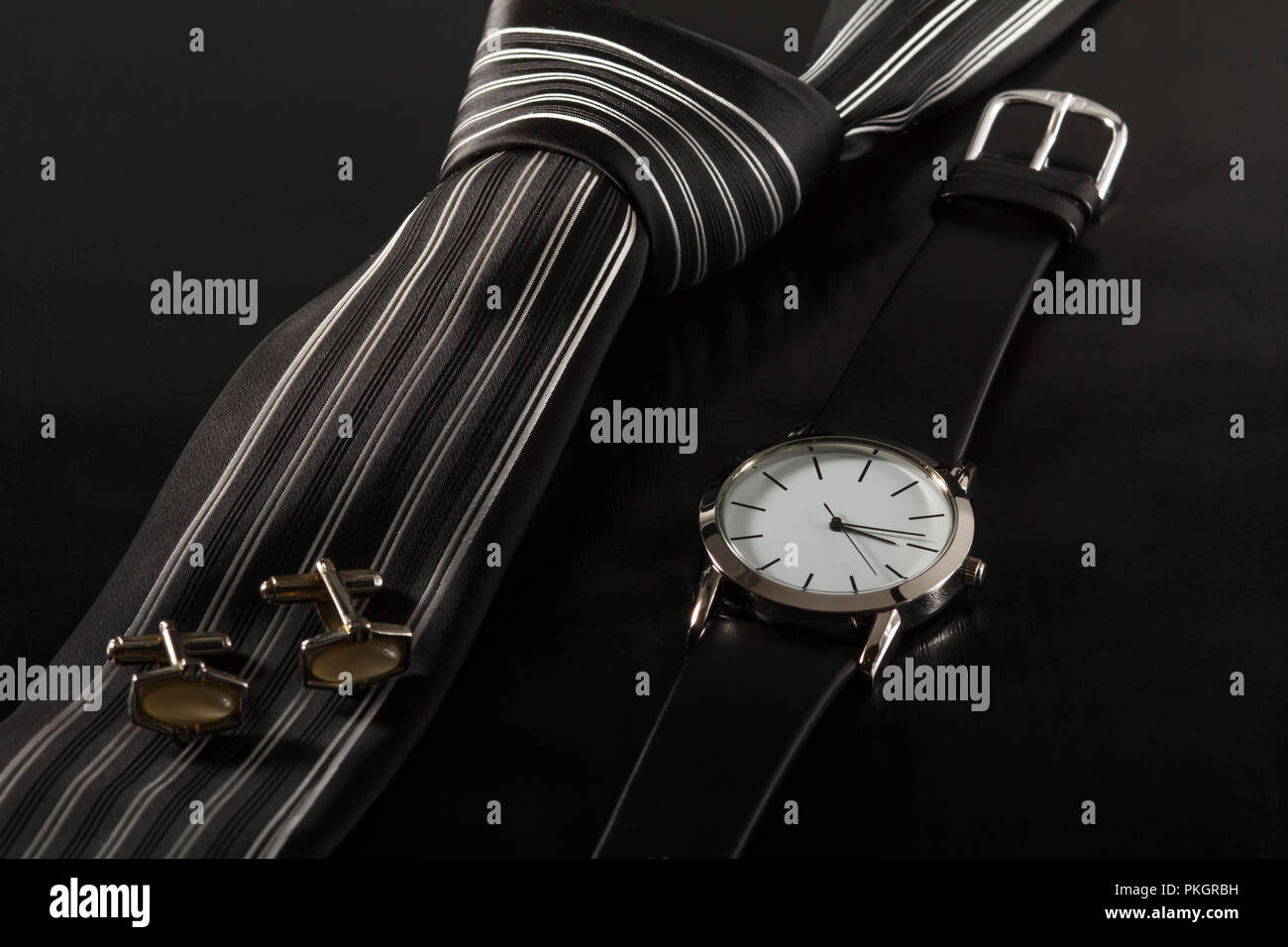 Tie and wrist watch hi-res stock photography and images - Alamy