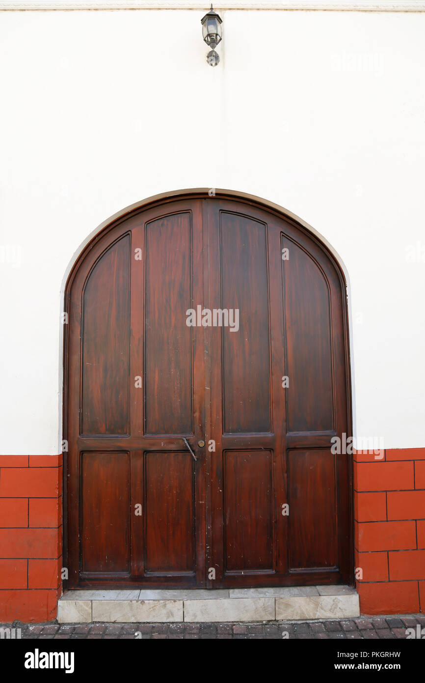 Arched wooden door Stock Photo - Alamy