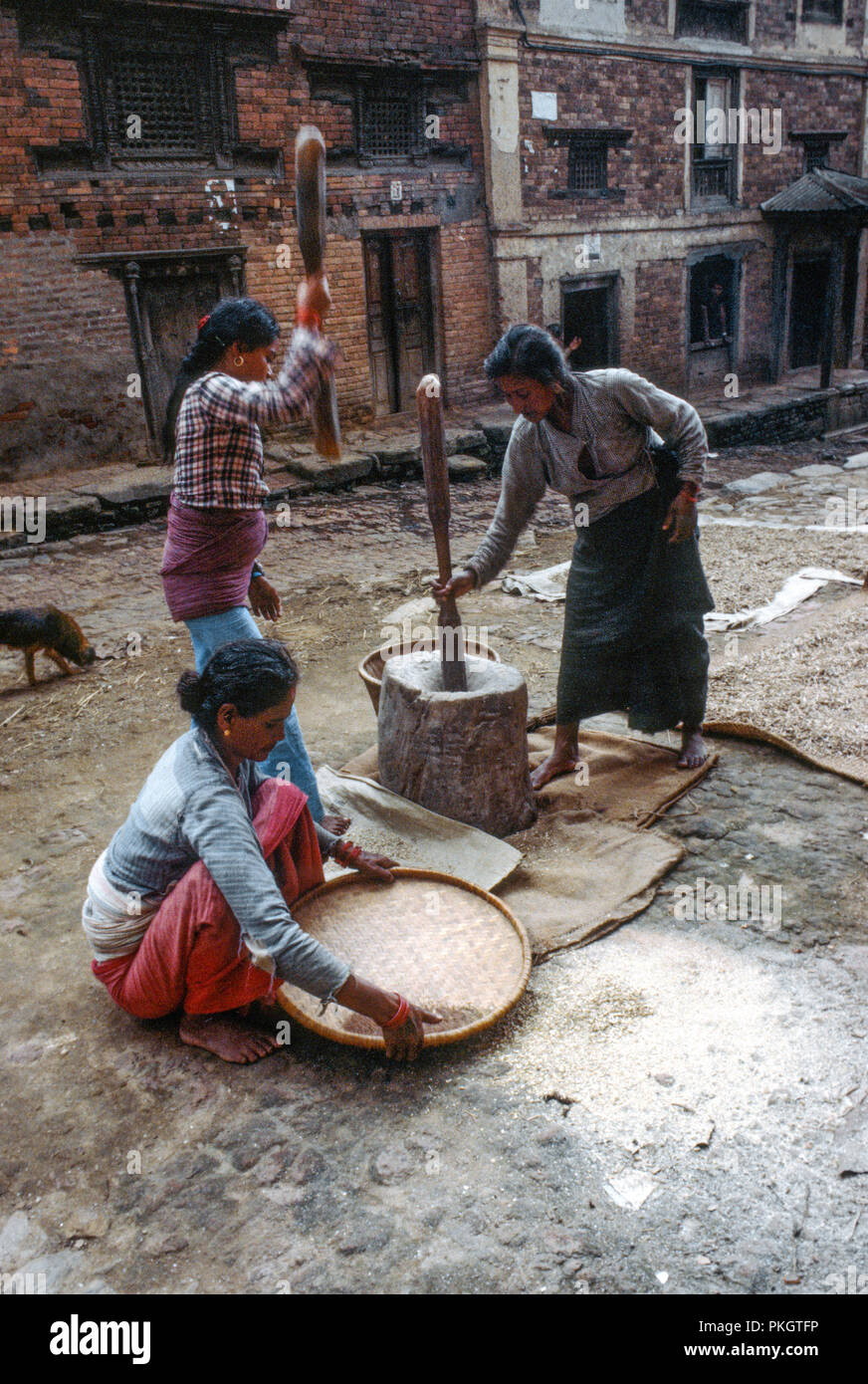Pounding maize hi-res stock photography and images - Alamy