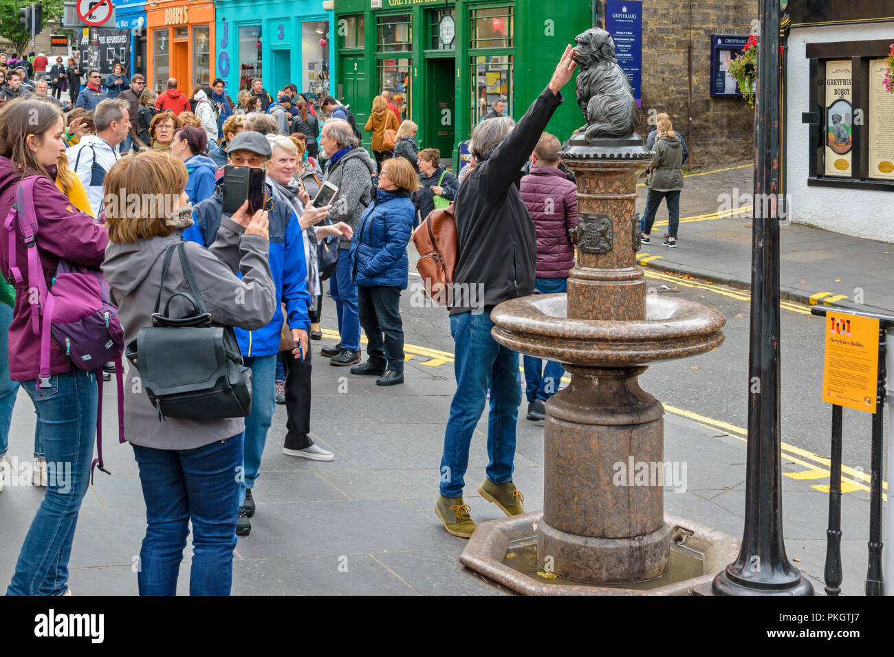 EDINBURGH SCOTLAND TOUCHING THE NOSE OF GREYFRIARS BOBBY STATUE Stock ...