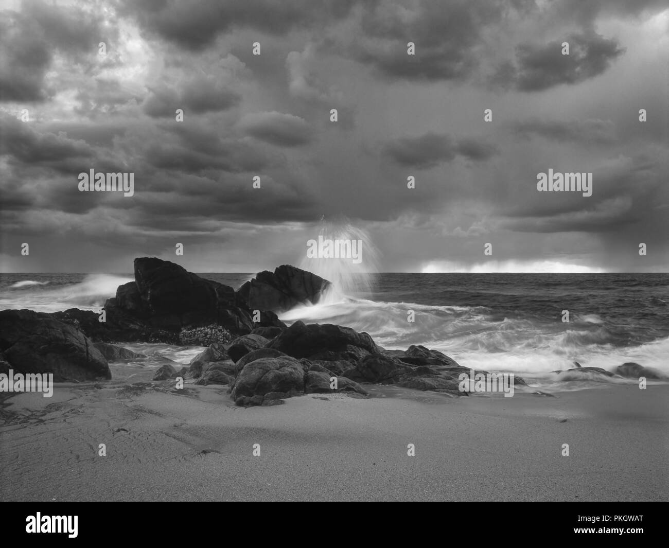 Overcast sky clouds ocean beach Black and White Stock Photos & Images ...