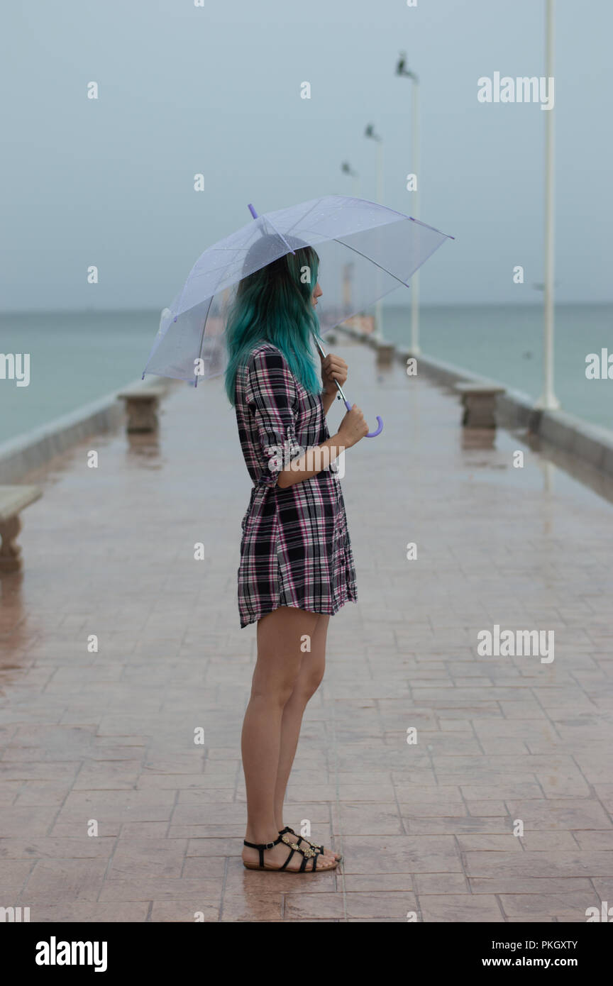 Sad Girl In The Rain With Umbrella
