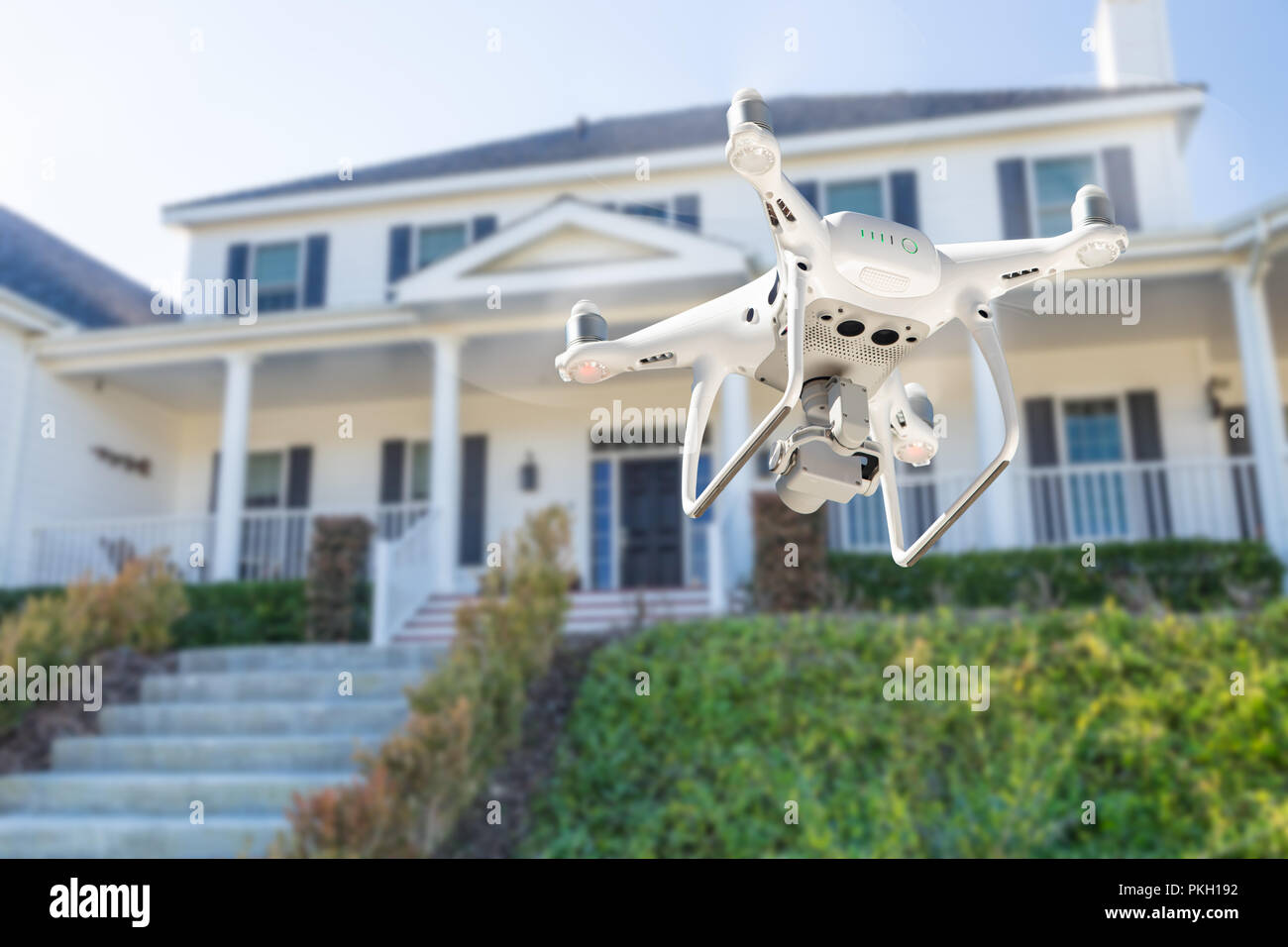 Drone Quadcopter Flying, Inspecting and Photographing House Stock Photo ...