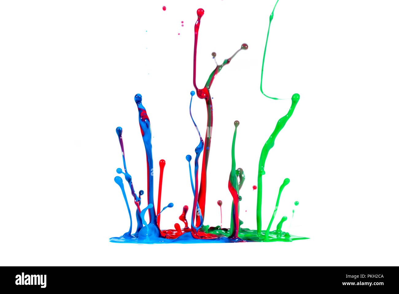 Splash of color ink on white background Stock Photo - Alamy