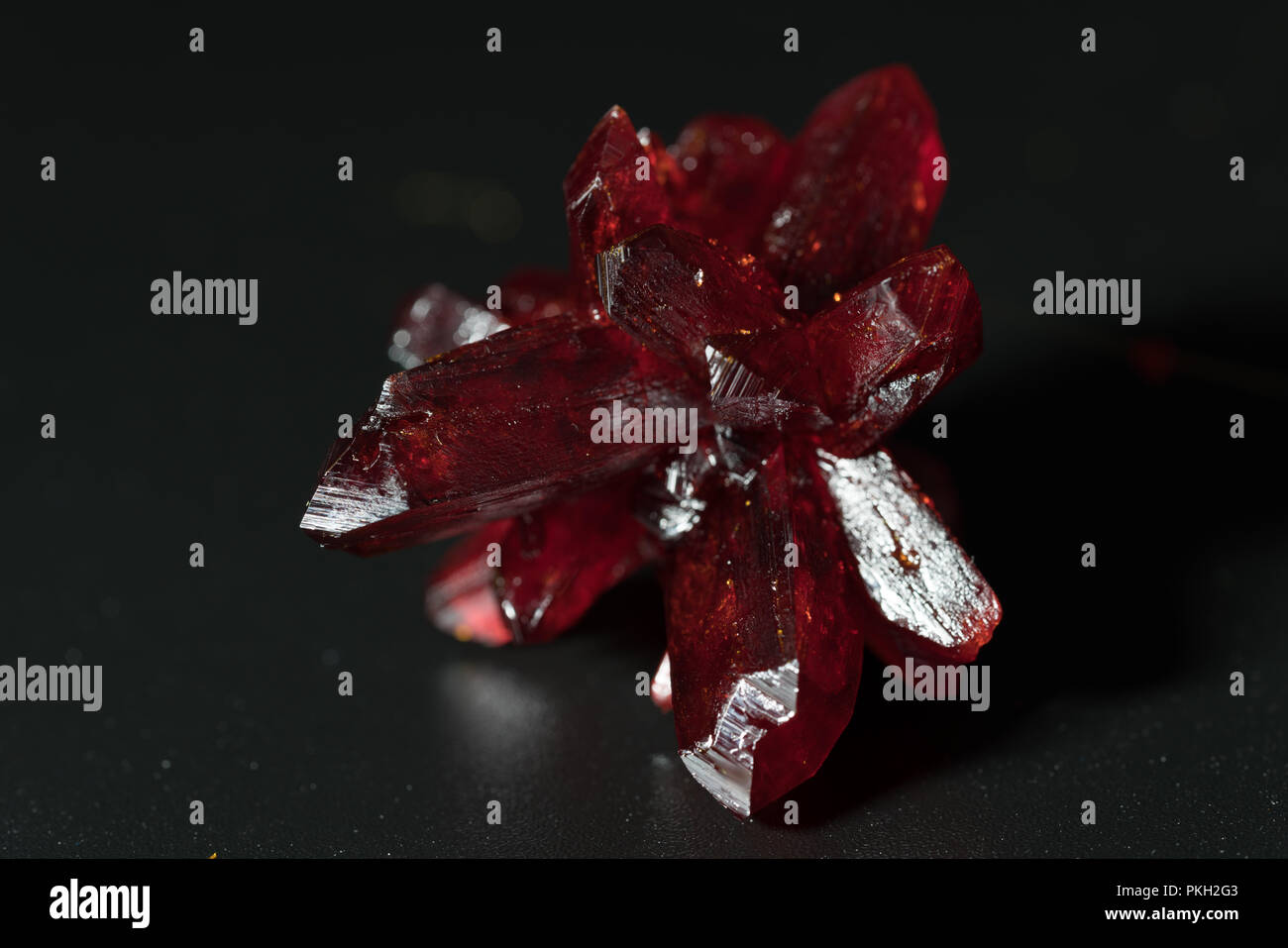 Red natural crystal. Natural mineral Stock Photo - Alamy