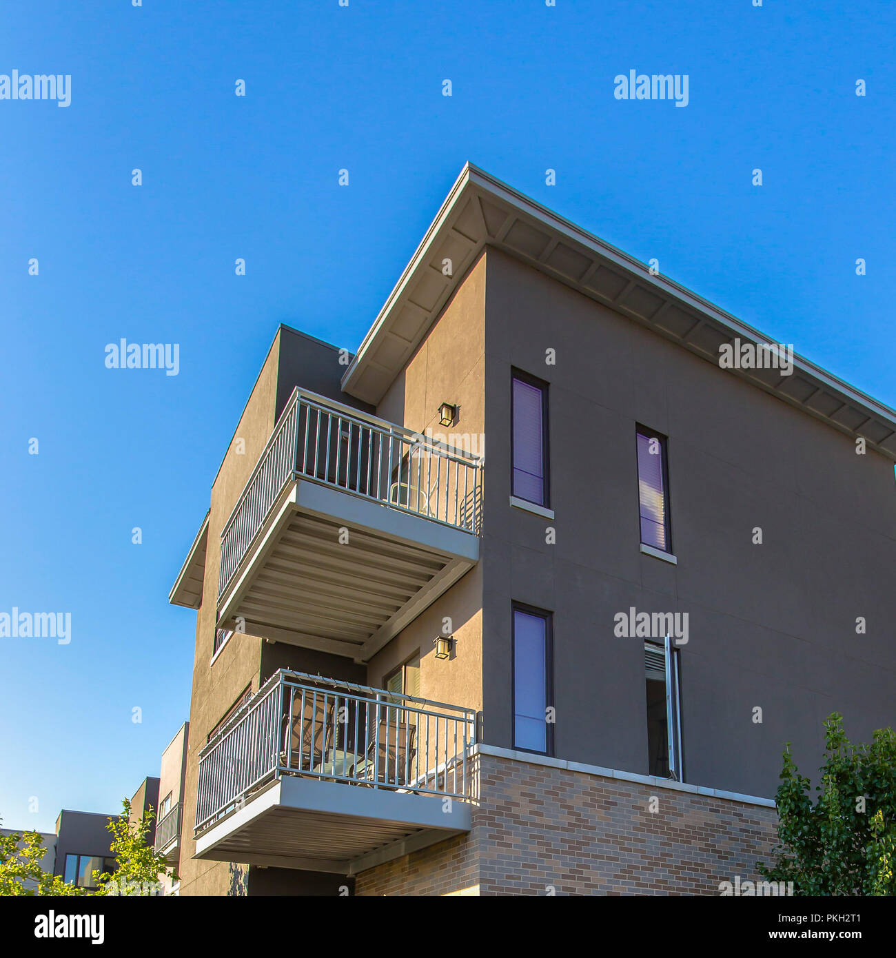 Exterior of a residential building with balconies Stock Photo - Alamy