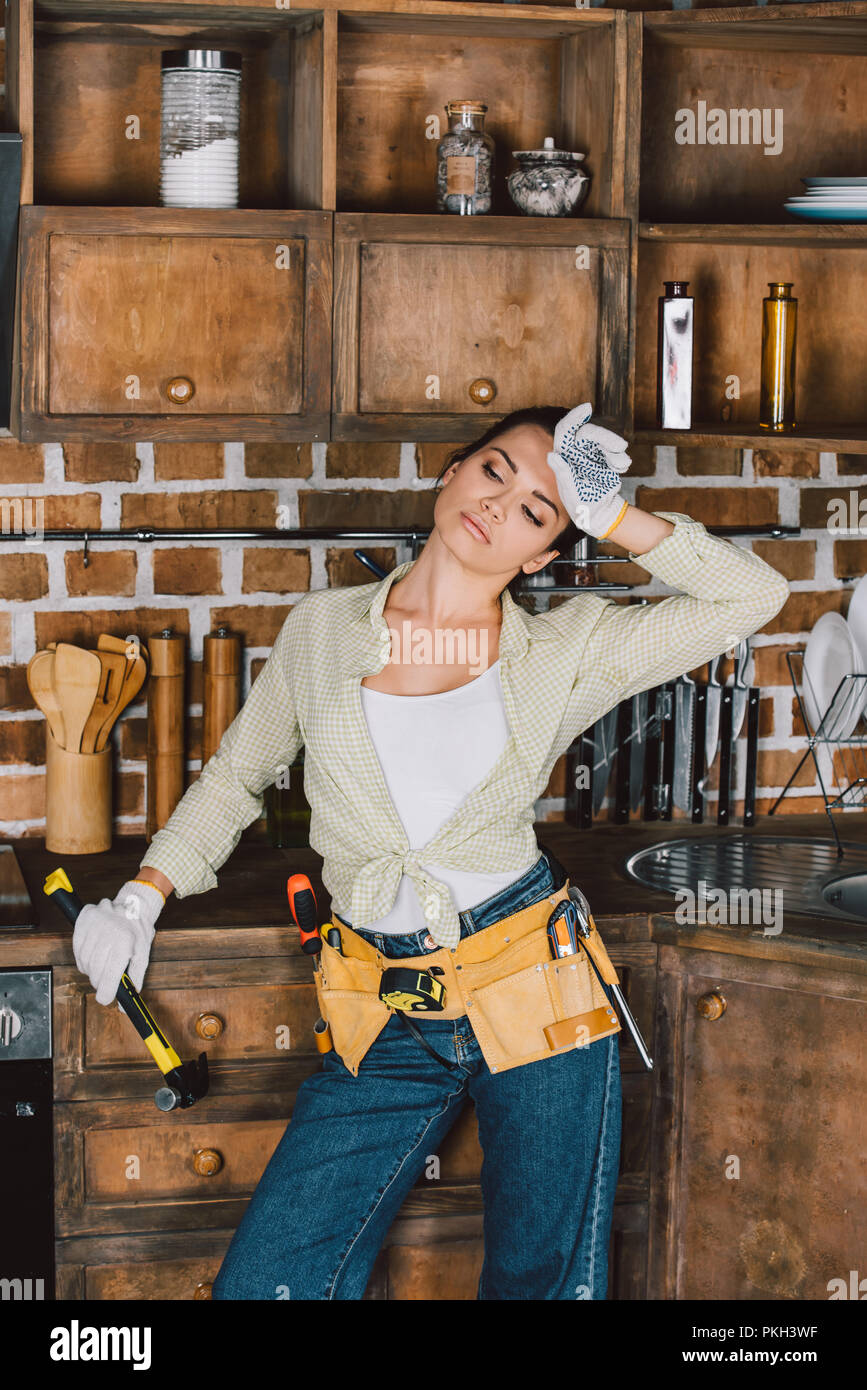 Female mechanic exhausted hi-res stock photography and images - Alamy