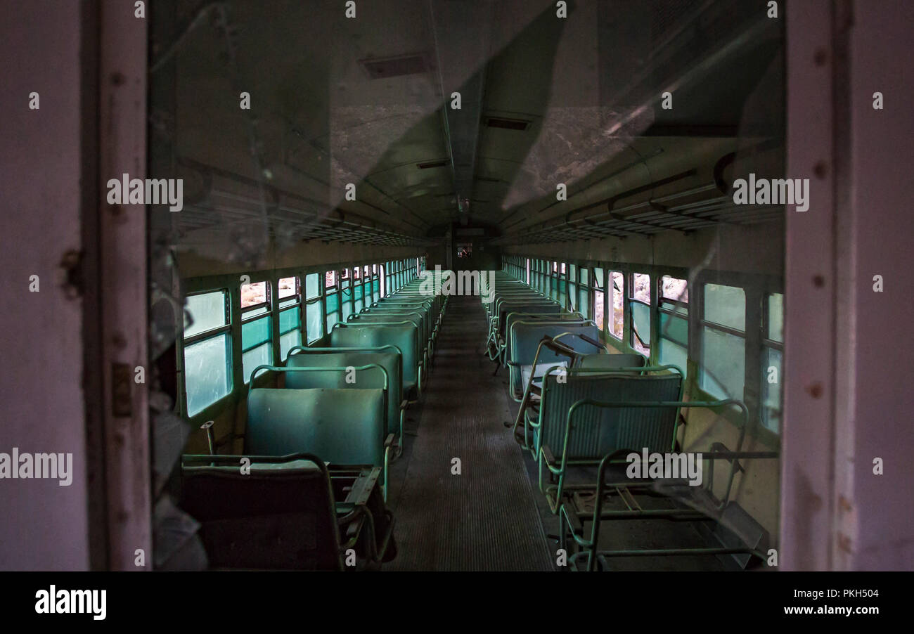 Looking through a broken glass inside an old train Stock Photo - Alamy