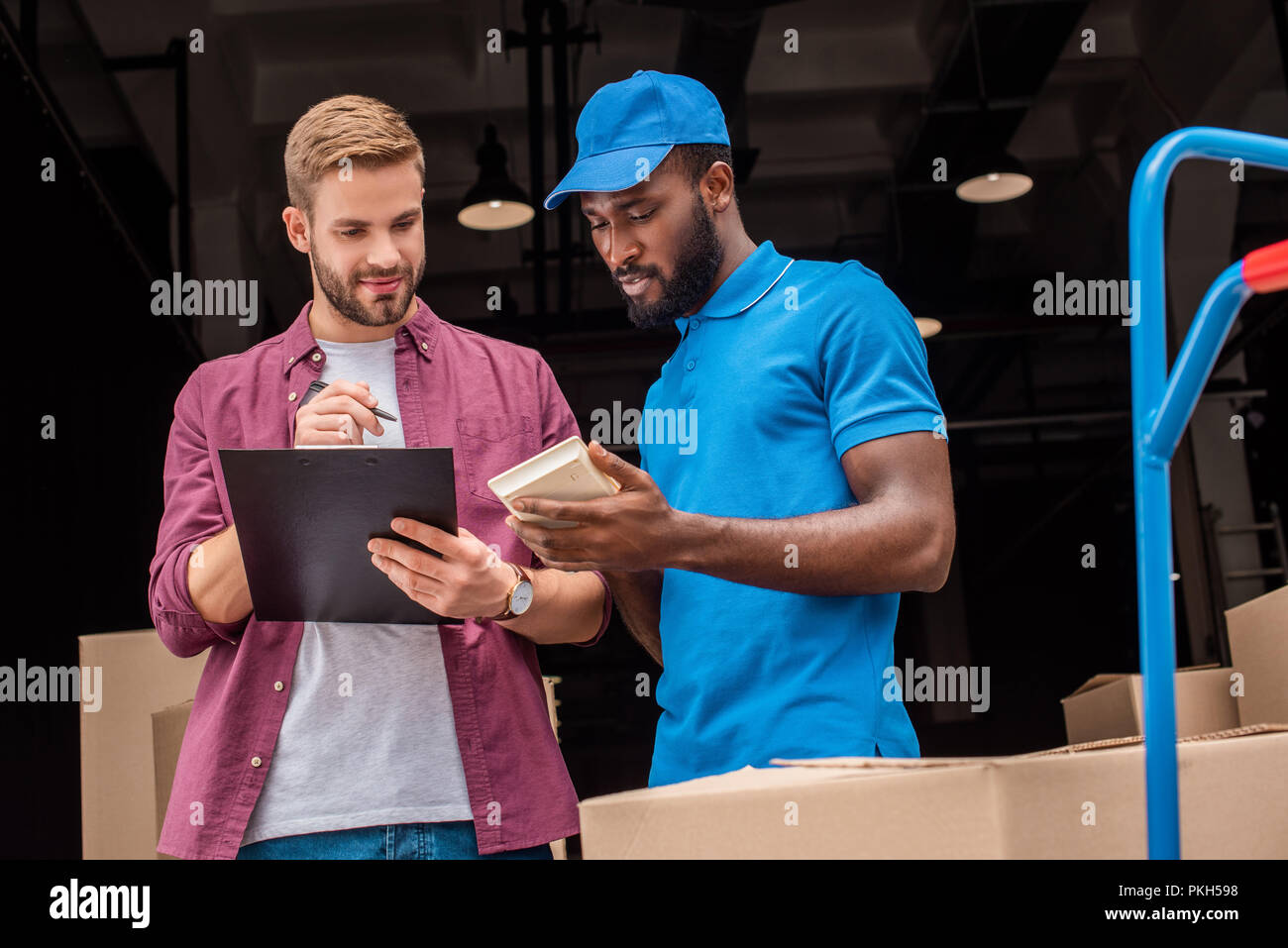 Counting packages hi-res stock photography and images - Alamy