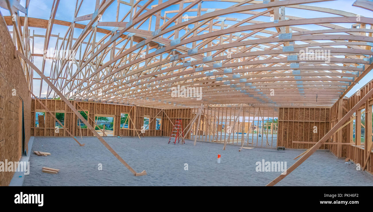 Newly constructed building late in day panorama Stock Photo - Alamy