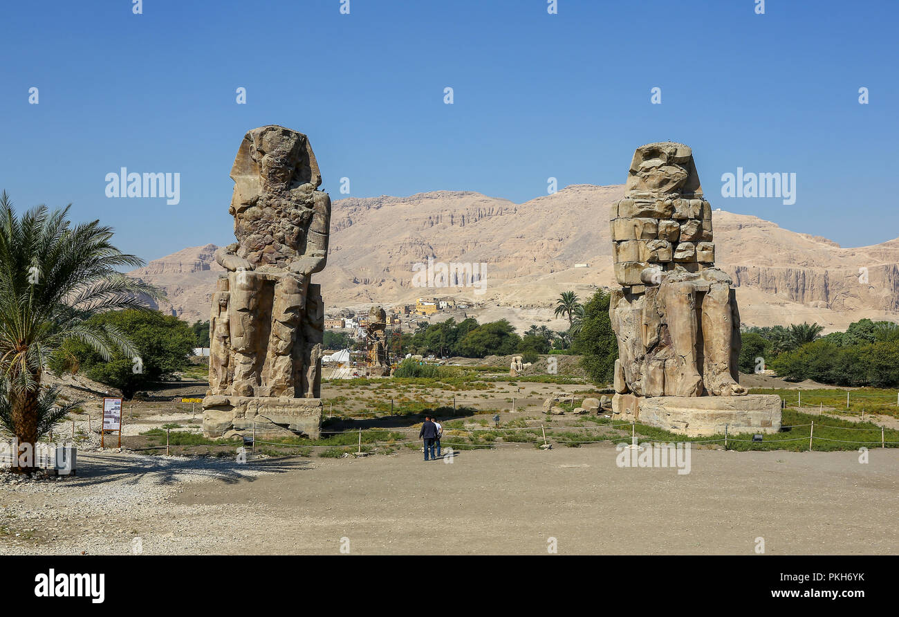 The Colossi of Memnon, two massive stone statues of the Pharaoh ...