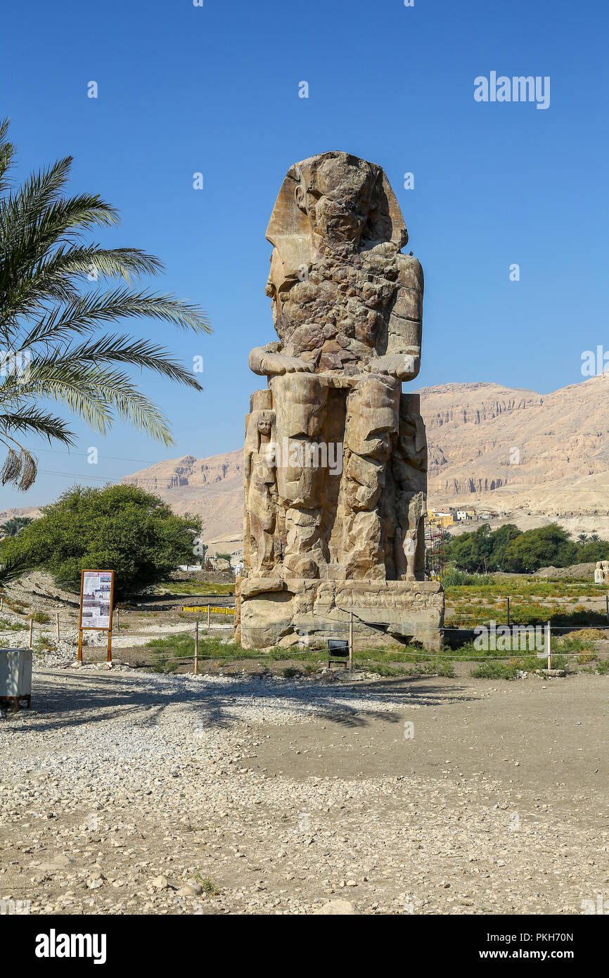 The Colossi of Memnon, two massive stone statues of the Pharaoh ...