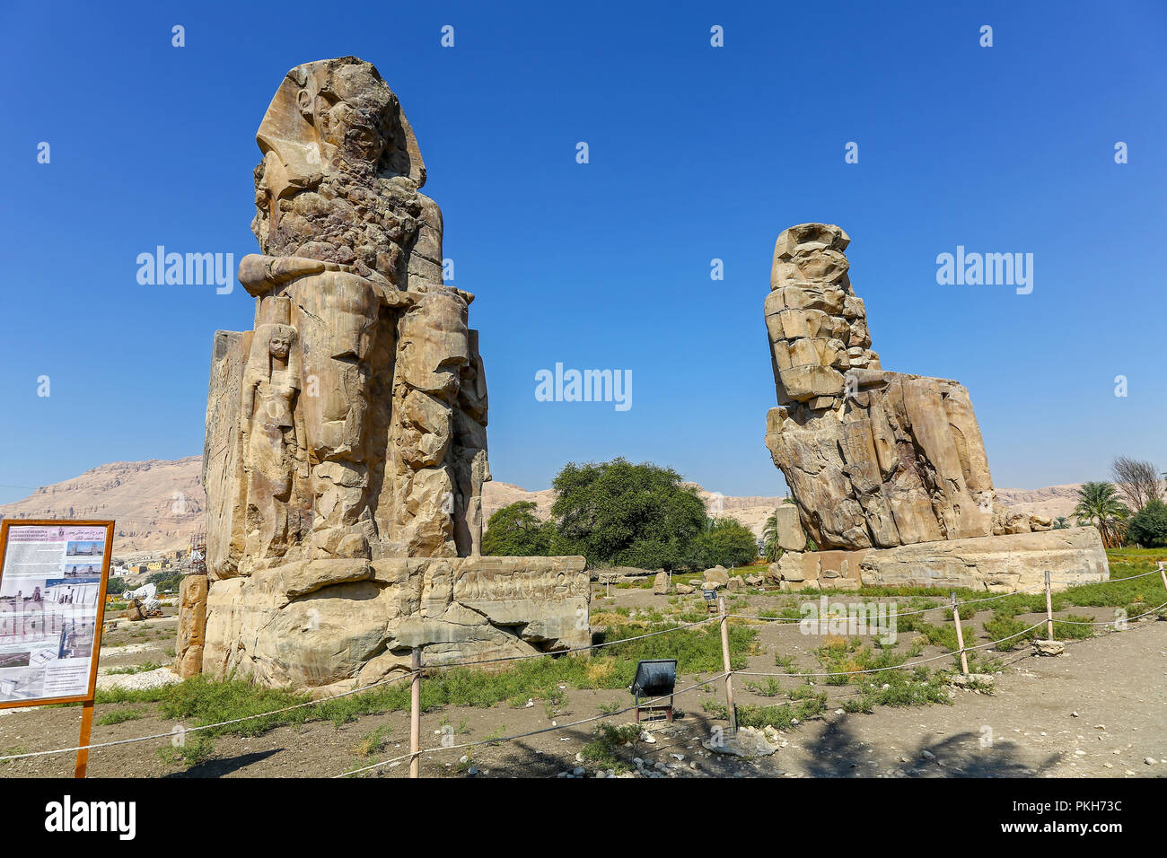 The Colossi of Memnon, two massive stone statues of the Pharaoh ...