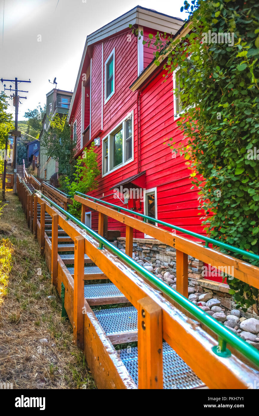 Red building with public stairs outdoor Park City Stock Photo - Alamy